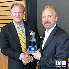 Jim Garrettson Presents Jason Providakes With Wash100 Award - GovCon Wire